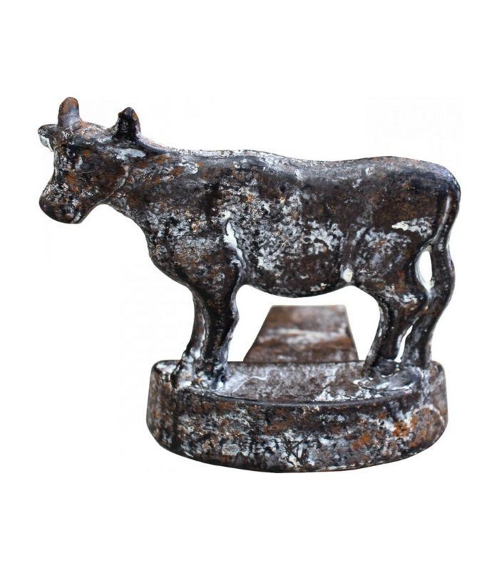 Stop doors in style with this adorable cow-shaped metal doorstop 🐄 ...